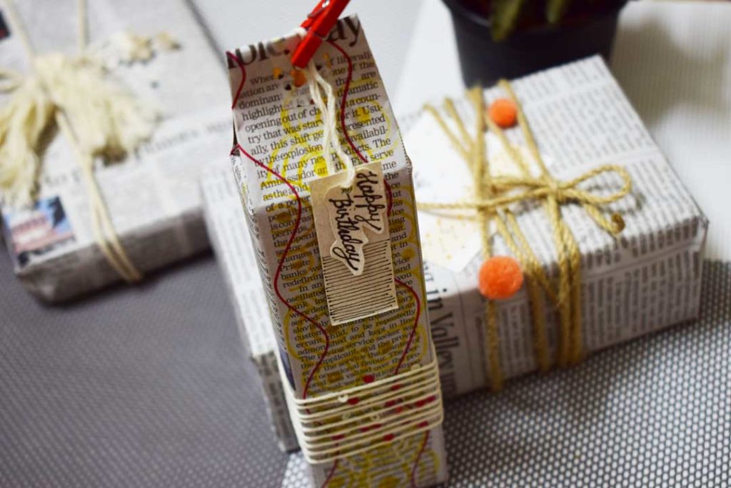 DIY NEWSPAPER GIFT WRAP – OoshyBooshy